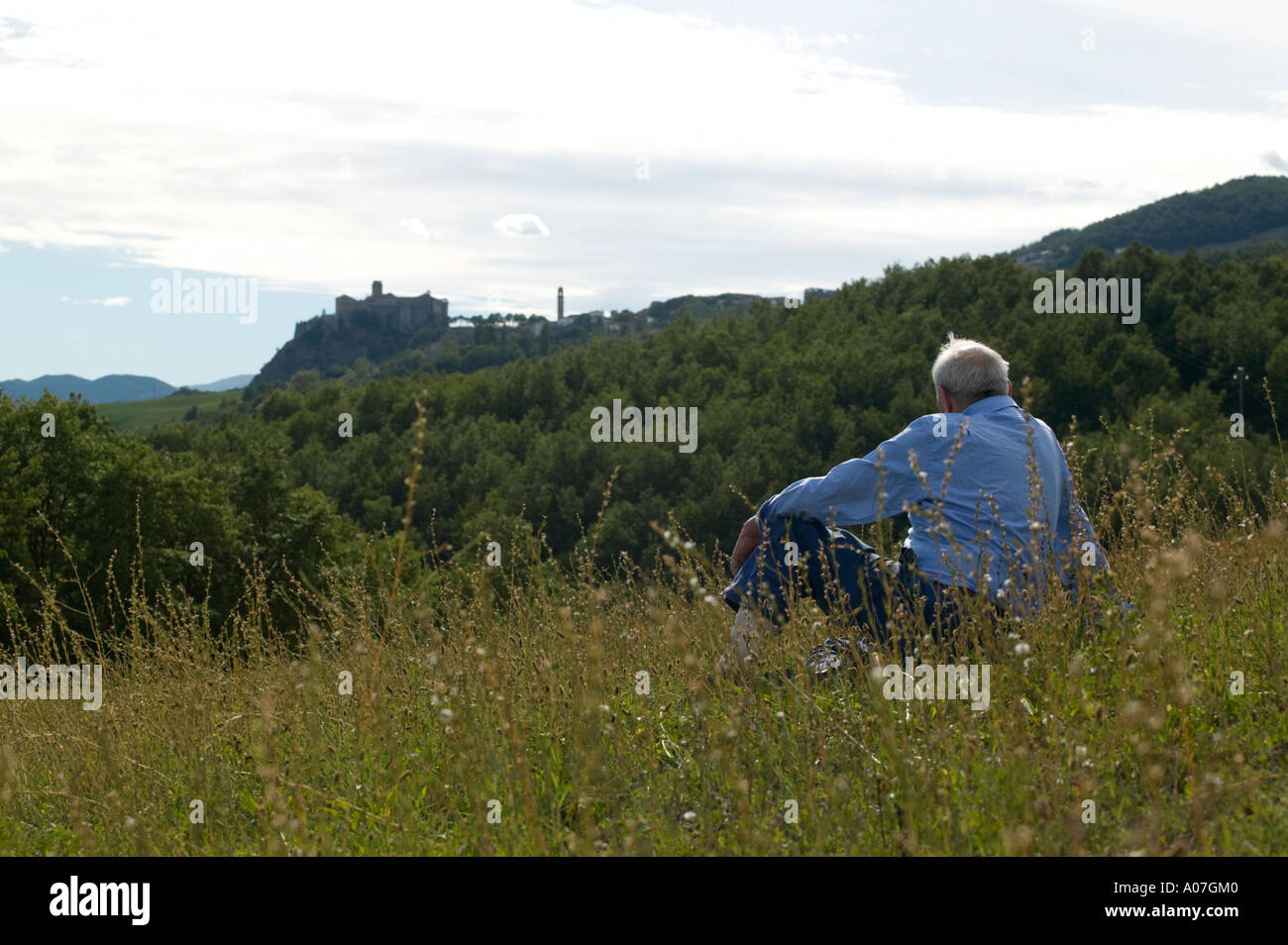 old man looking out over his land Stock Photo - Alamy