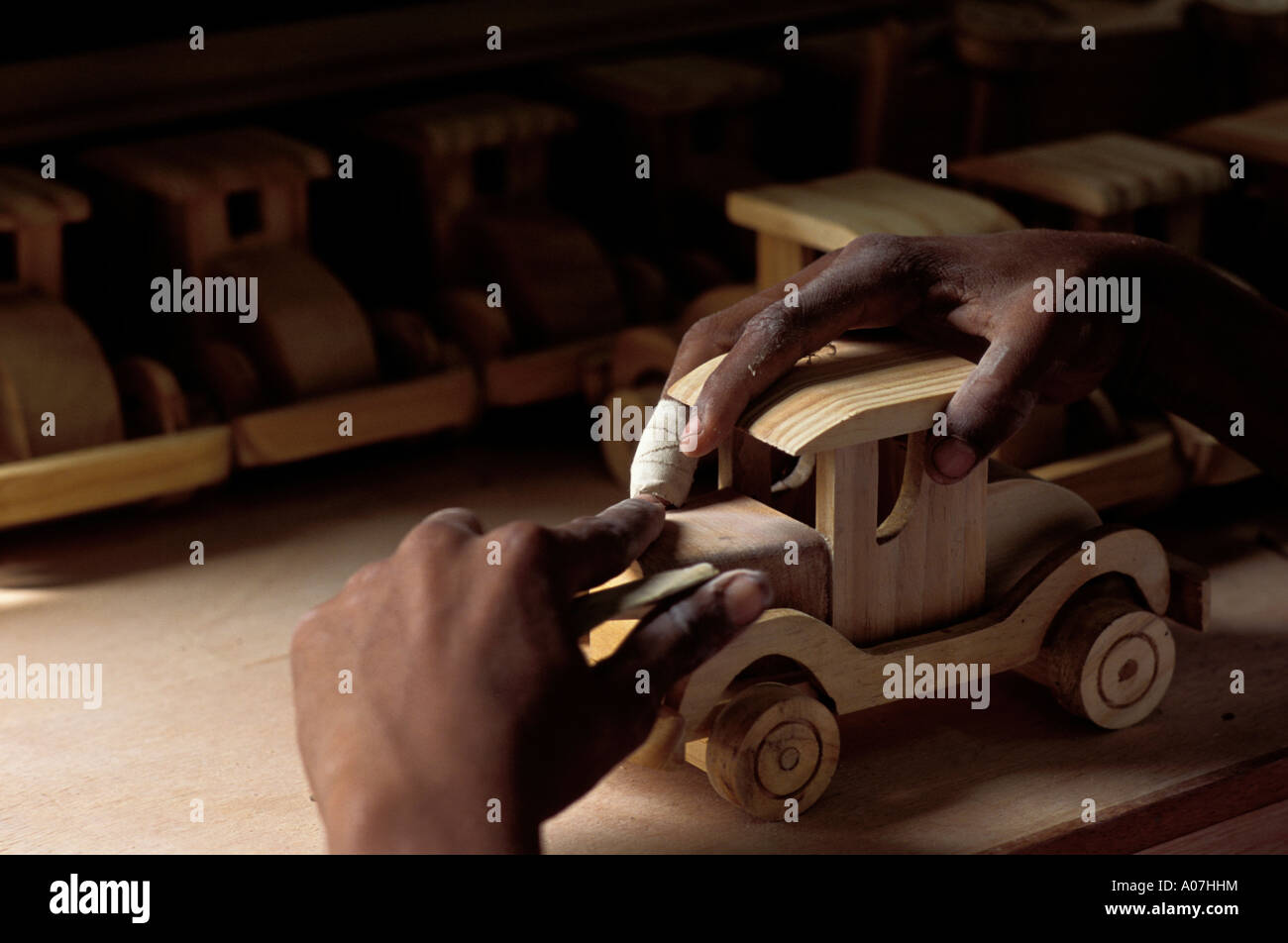 Poor children learn how to produce wooden toys in order to generate ...