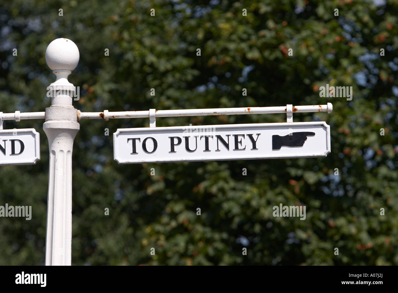 Old road sign to Putney on the Lower Richmond Road Stock Photo - Alamy