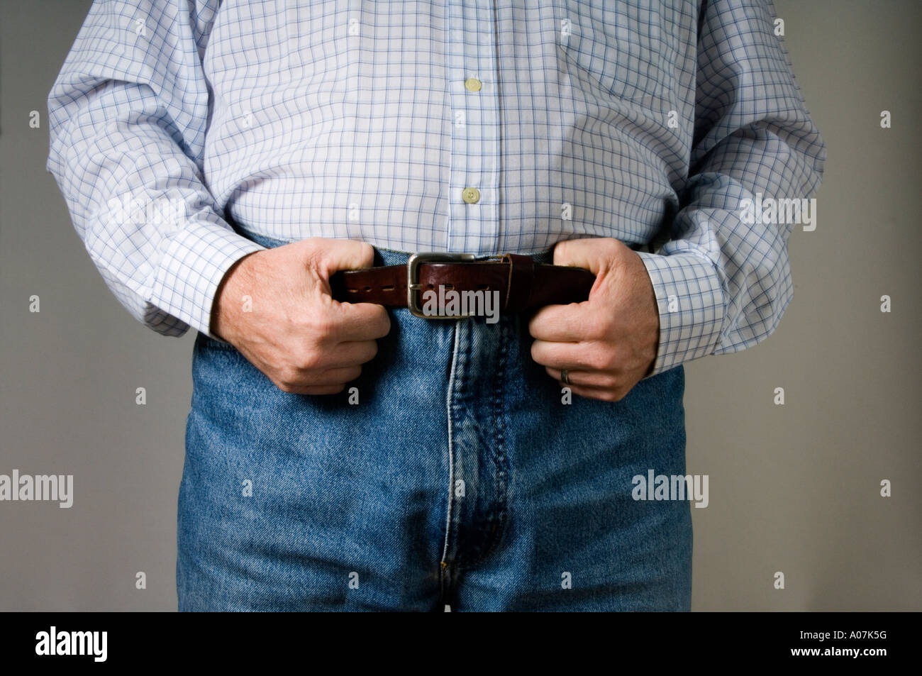 Man casual relaxed hand thumb belt hi-res stock photography and images ...