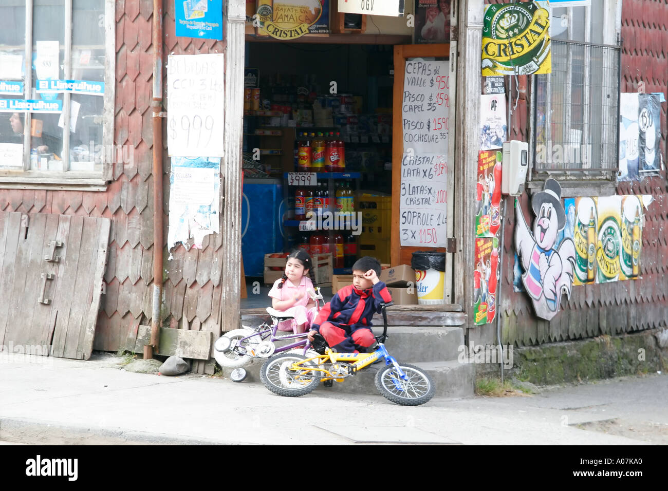 local children outside a shop Chonchi Chiloe Chile south america Stock ...