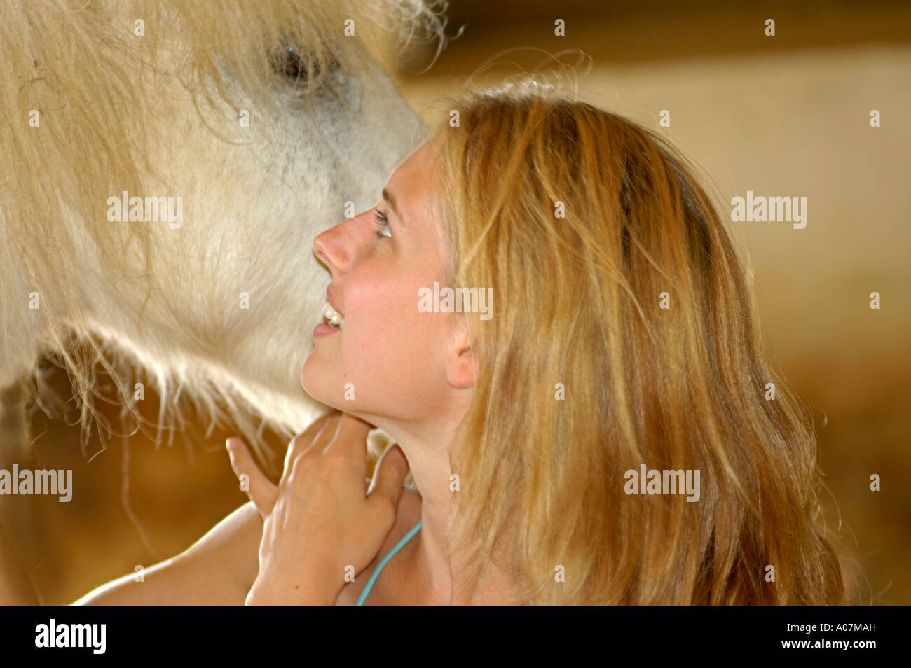Girl cuddles with her horse hi-res stock photography and images - Alamy