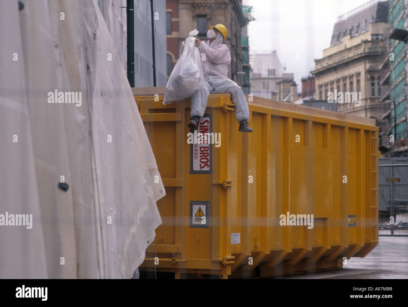 clearing asbestos after the bomb destruction in central Manchester ...