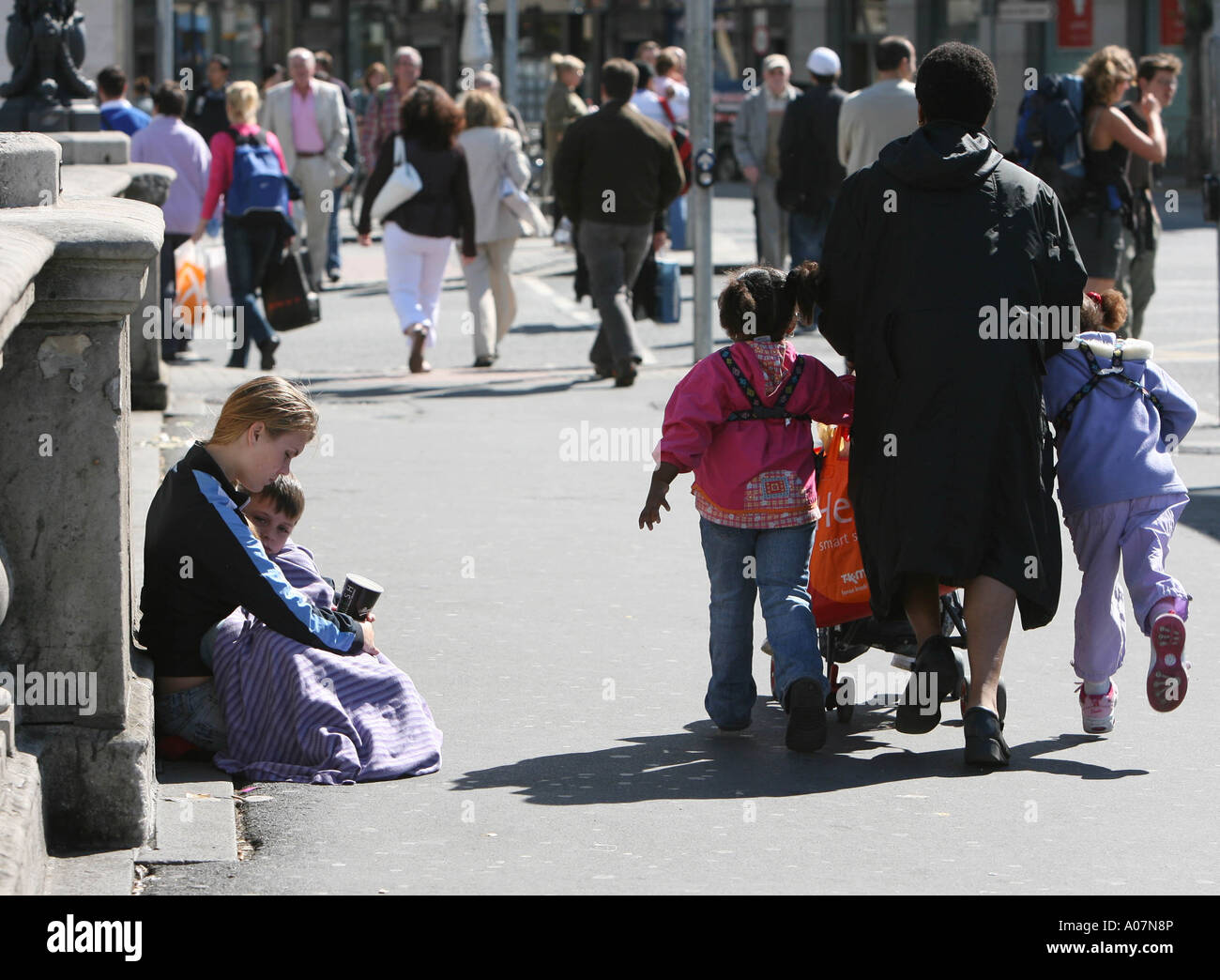 Child begging on O Connell Street Dublin Ireland Stock Photo - Alamy