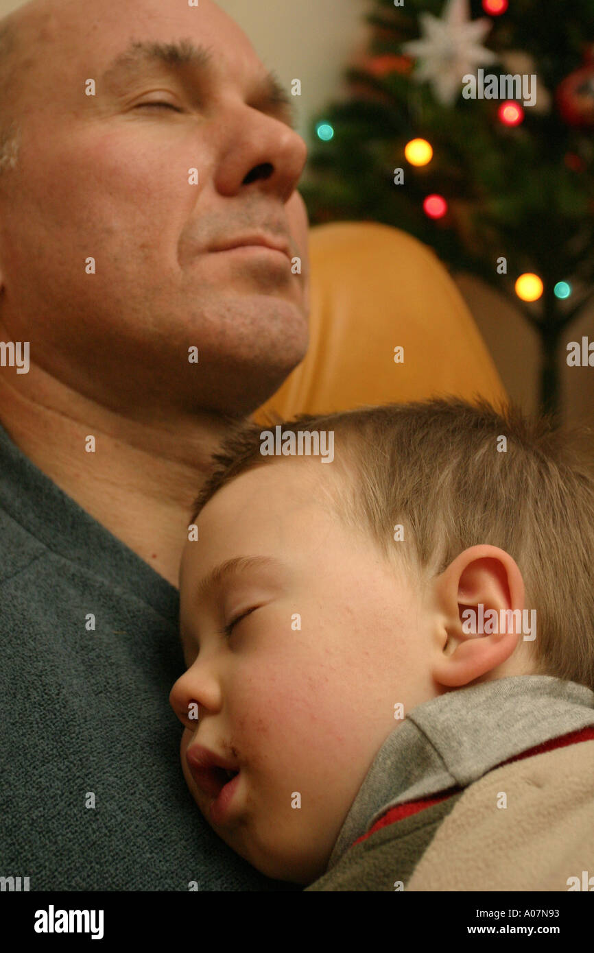 Father boy sleeping sofa hi-res stock photography and images - Alamy