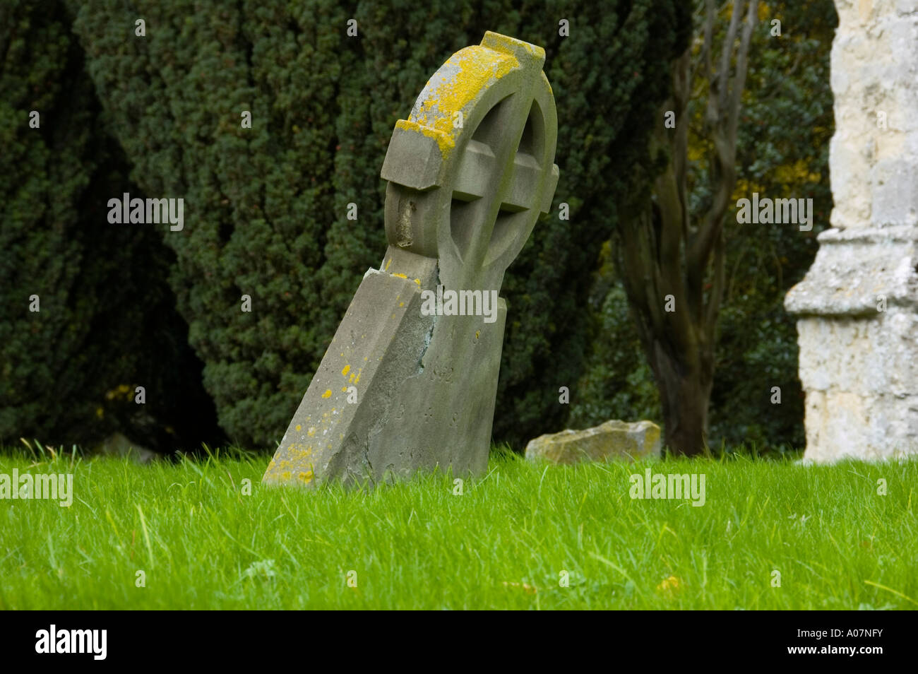Gravestone Leaning over Stock Photo - Alamy