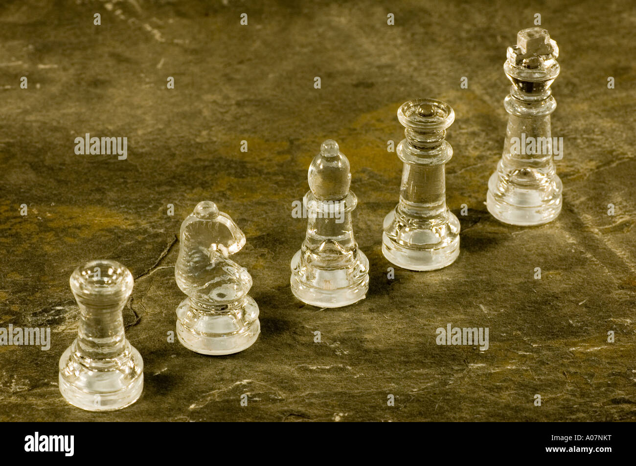 Set of Five Glass Chess Pieces in a line Stock Photo - Alamy