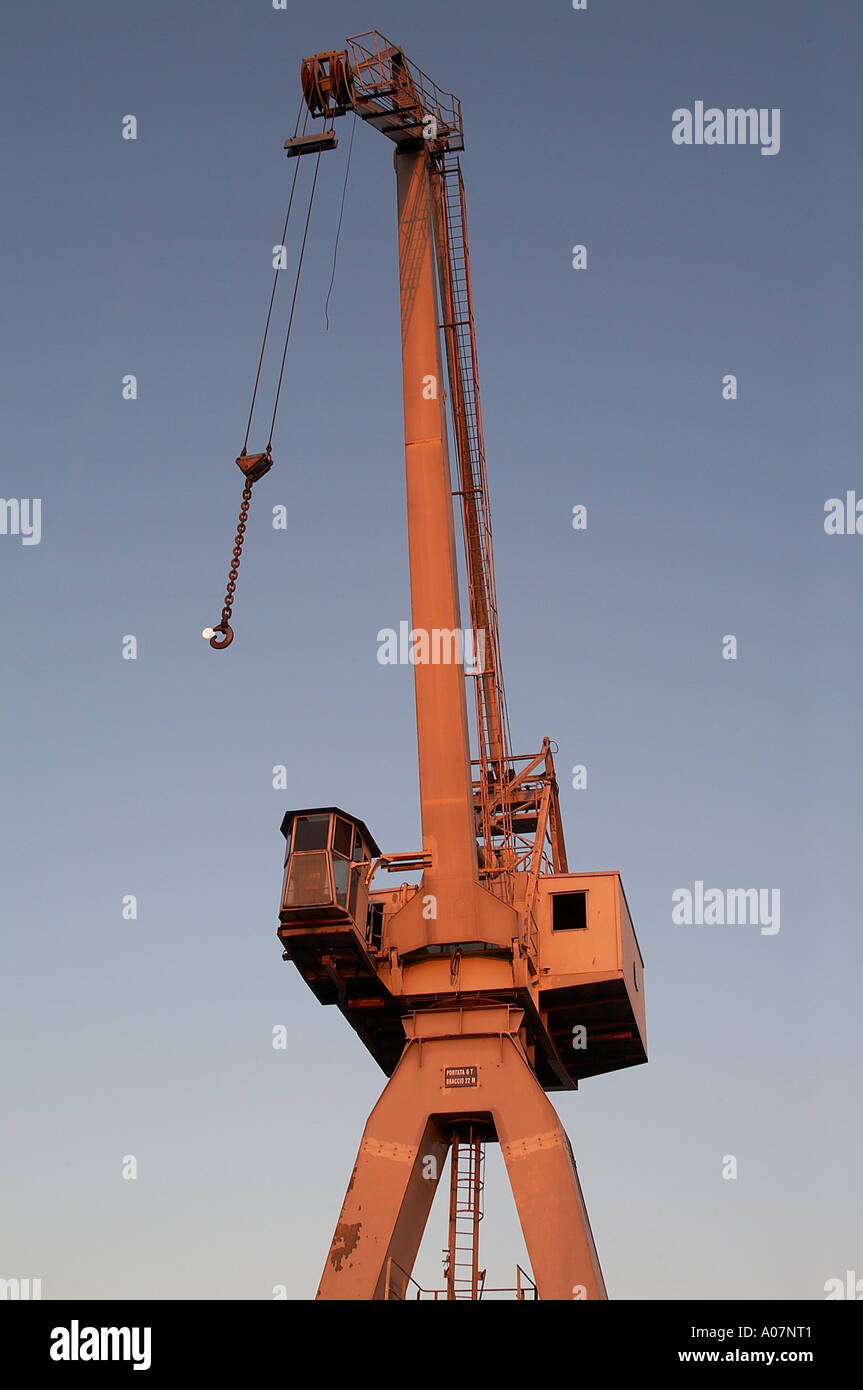 Port Crane Captures the Moon Stock Photo - Alamy