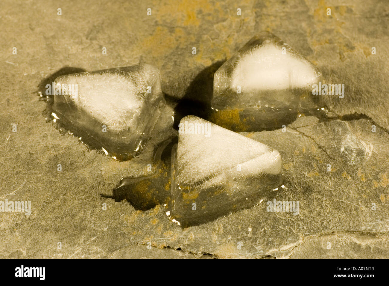 Ice cubes on grey hi-res stock photography and images - Alamy