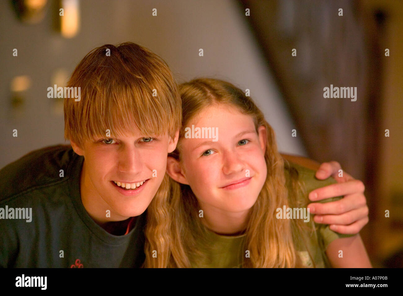 Portrait of two cousins boy and girl Stock Photo - Alamy