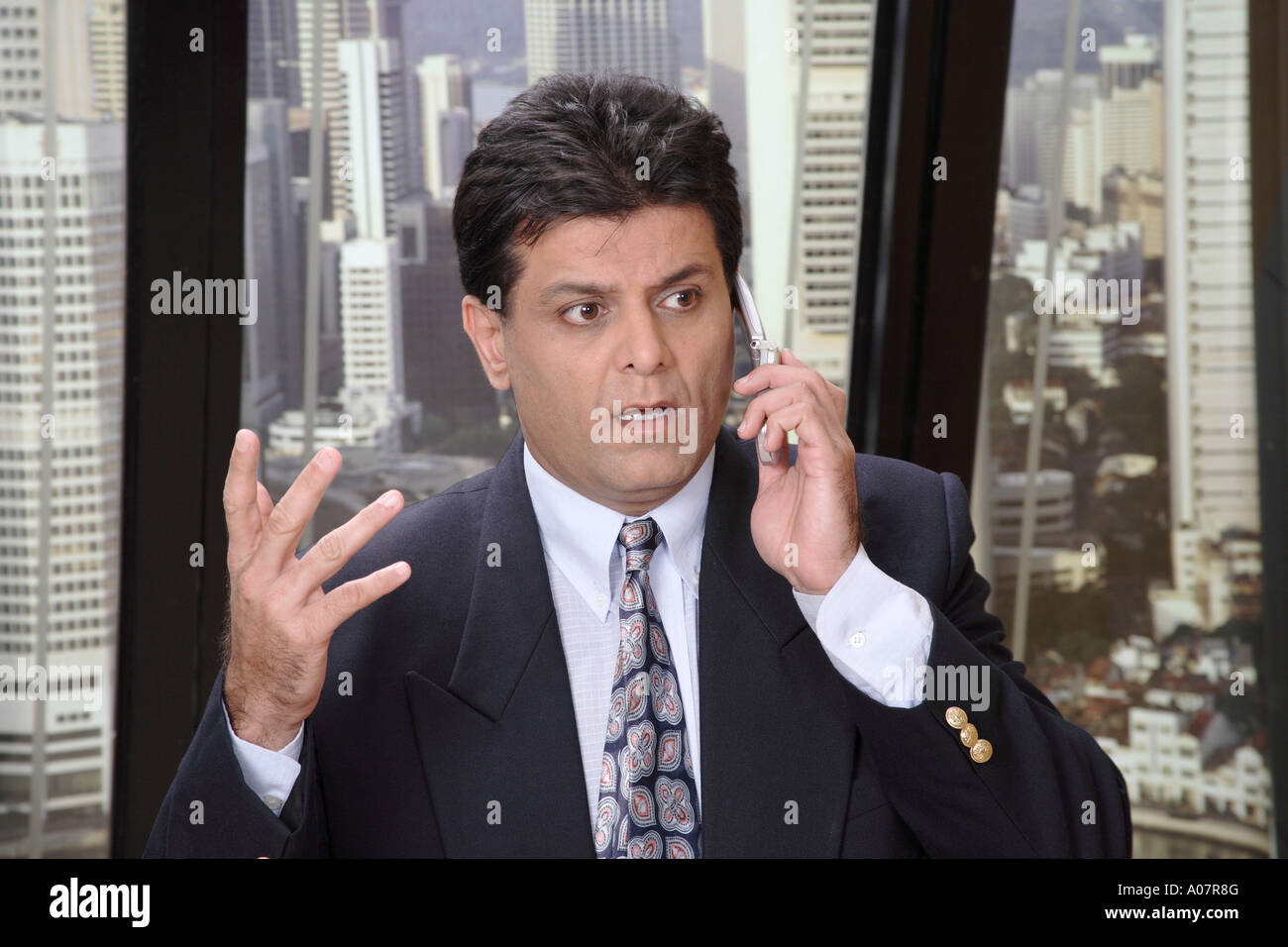 CEO on mobile phone in his cabin in business suit Stock Photo - Alamy