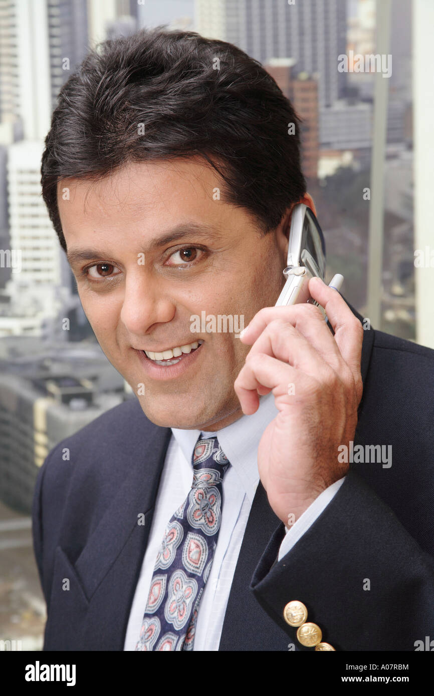 CEO portrait on cellphone in his cabin in business suit Stock Photo - Alamy