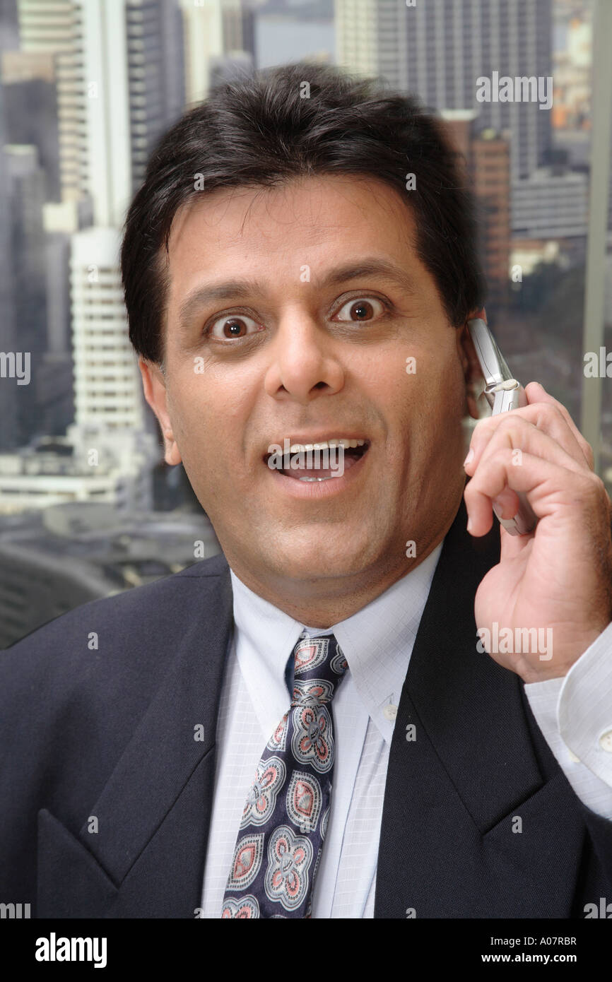 CEO portrait talking on cellphone in his cabin in business suit Stock ...