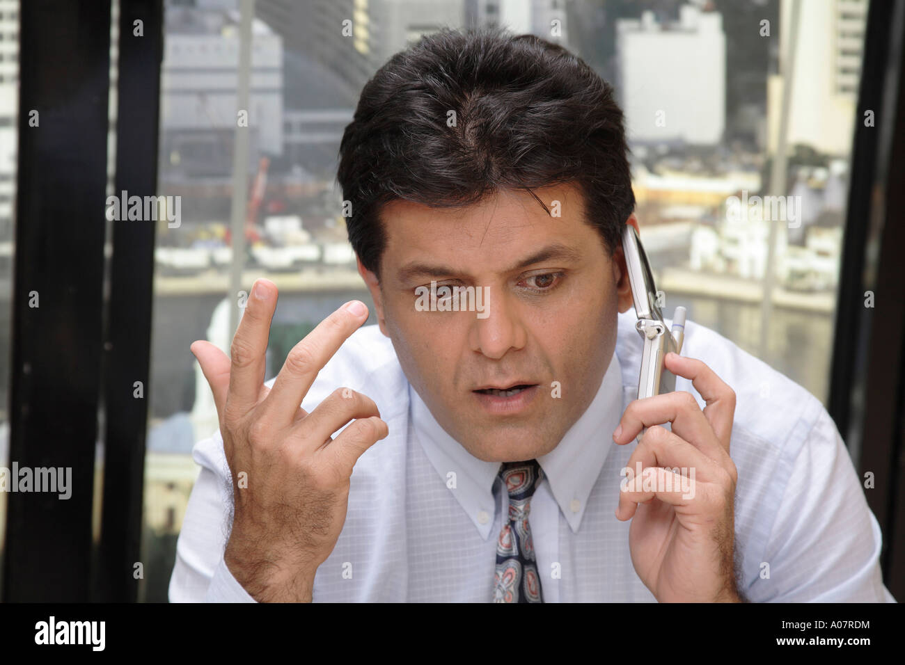 Worried business man talking phone hi-res stock photography and images ...
