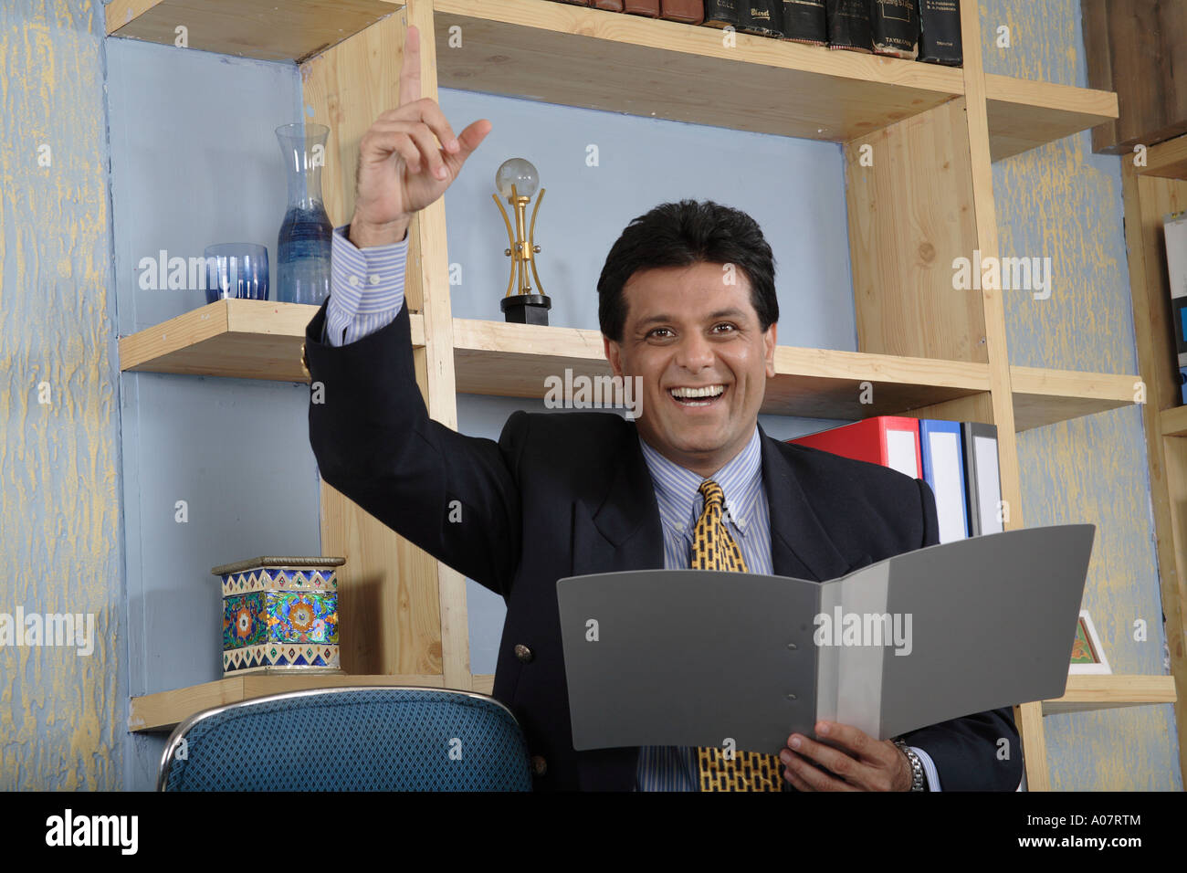 CEO happy reading report in his office cabin in business suit Stock ...