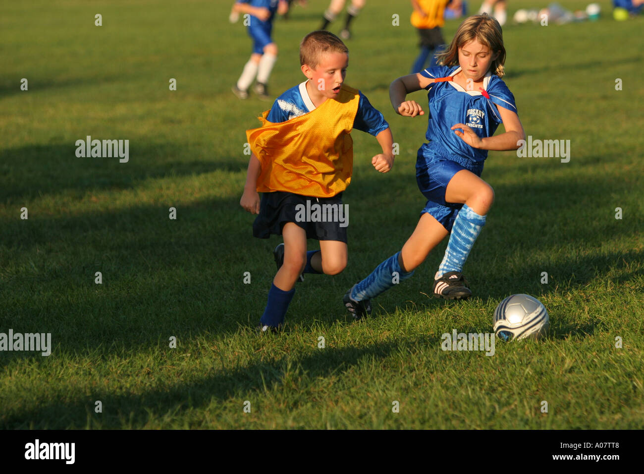 Young lads playing football hi-res stock photography and images - Alamy