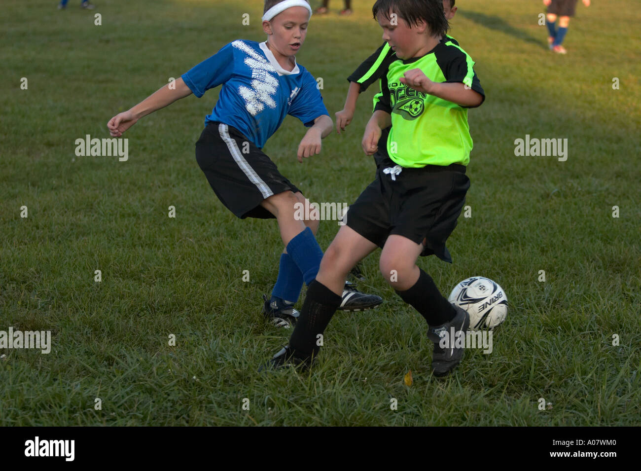 Boys playing soccer (football) in a youth league in the United States ...