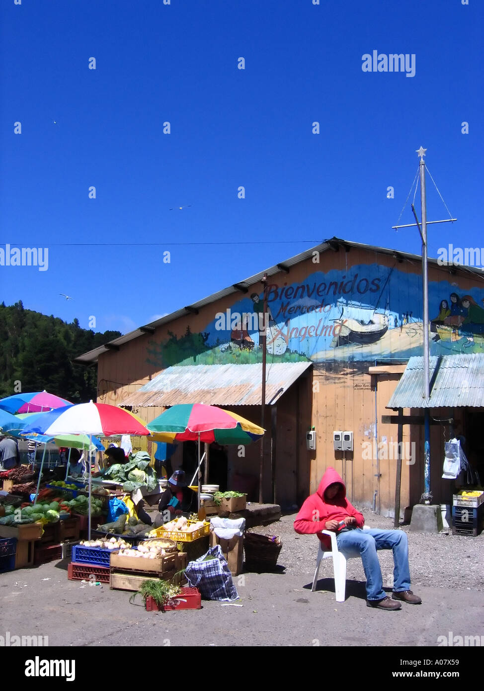 boy rests outside market Angelmo Puerto Montt Chile south america Stock ...