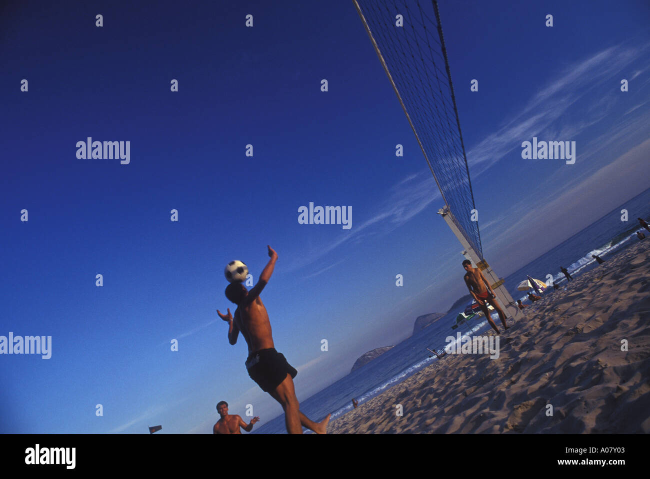 Sports futevolei or footvolley in Brazil This is the beach volleyball ...
