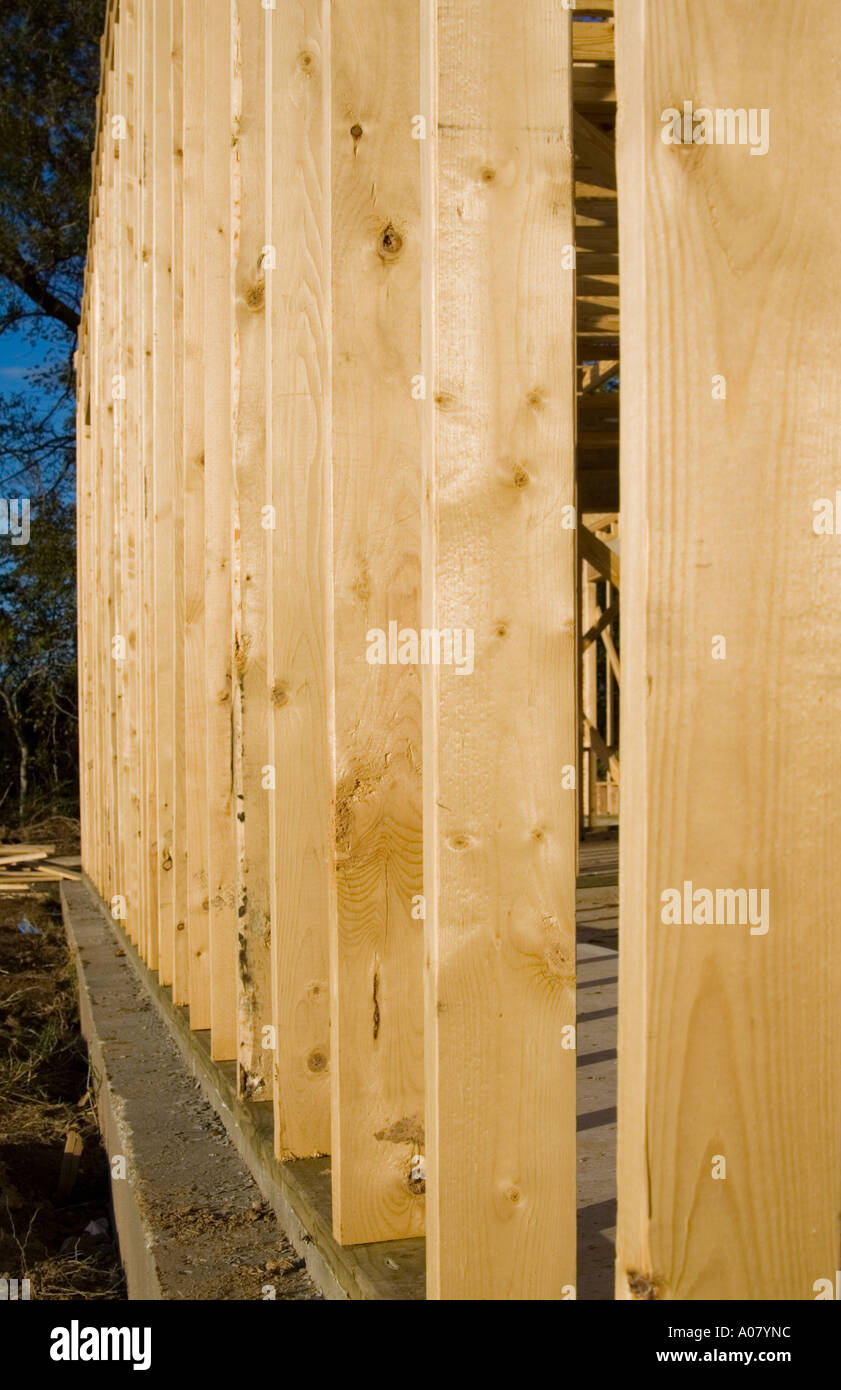 Vertical studs on house frame Stock Photo - Alamy