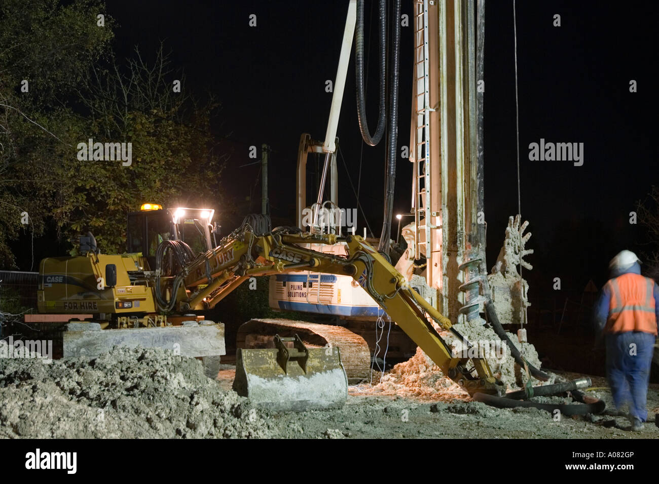 Piling foundations for road bridge at night Stock Photo - Alamy
