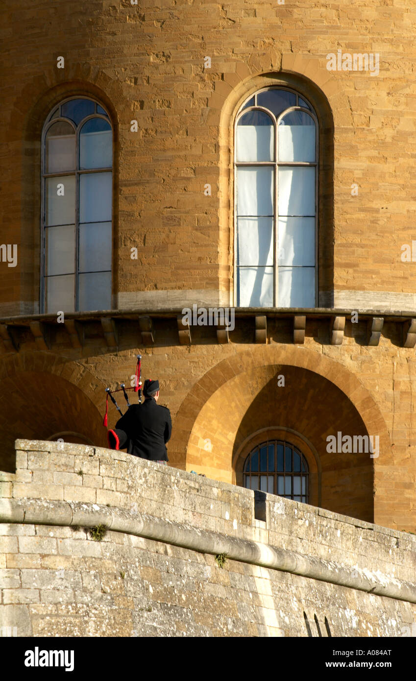 Piper playing the bagpipes Stock Photo - Alamy
