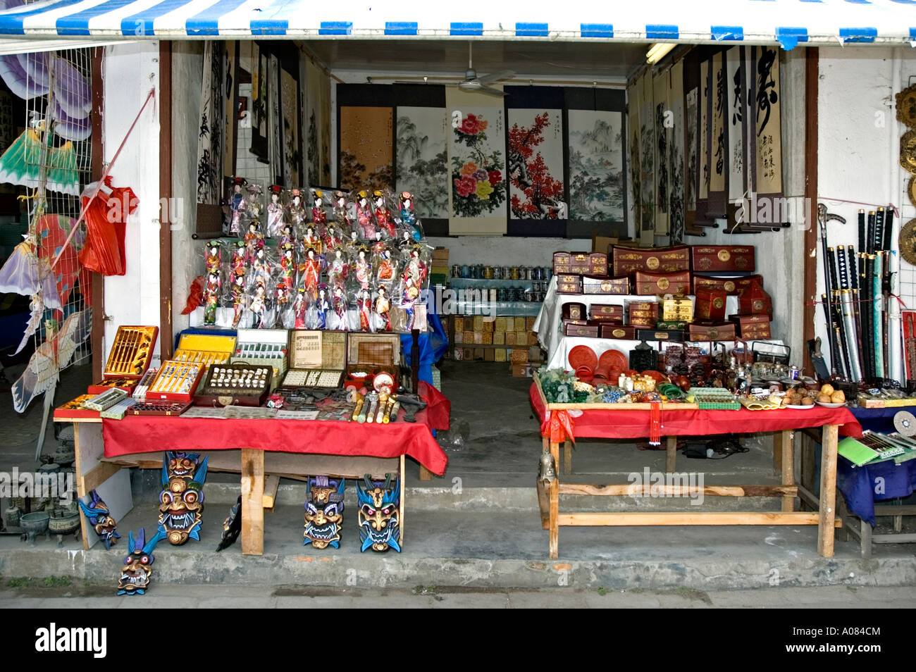 A colourful shop displaying plenty of traditional Chinese souvenirs ...