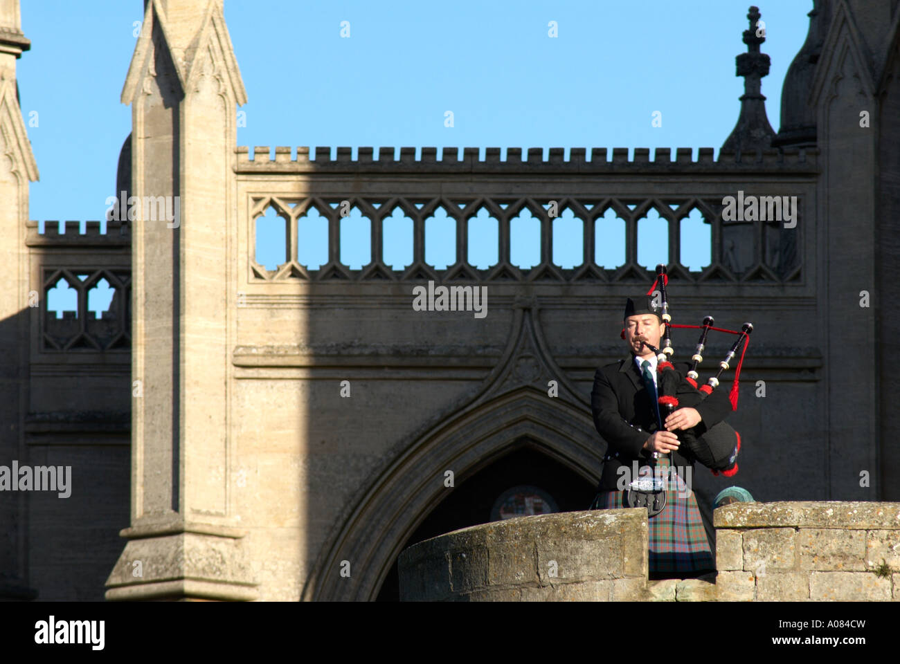 Piper playing the bagpipes Stock Photo - Alamy