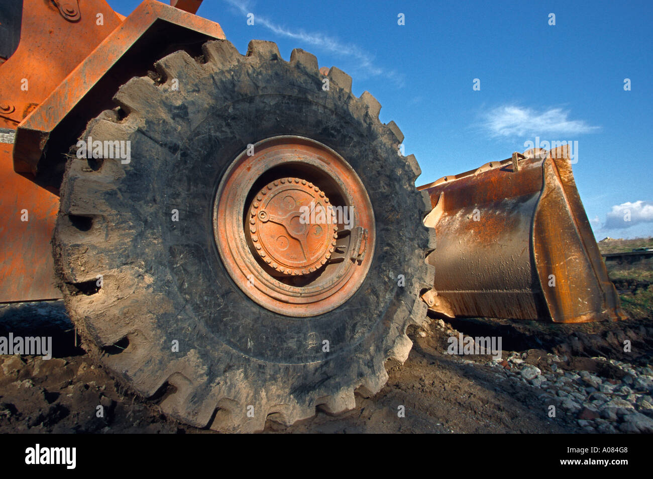 Bulldozer on a construction site, Big Wheel Stock Photo - Alamy