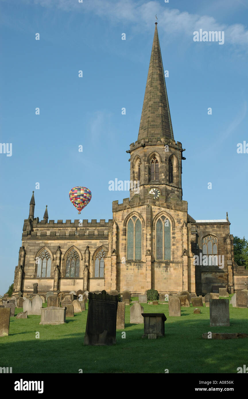 hot air balloon passing behind All Saints Parish Church, Bakewell ...
