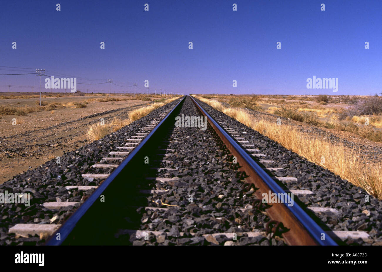 Railway line endless straight desert lonely South Africa train line ...