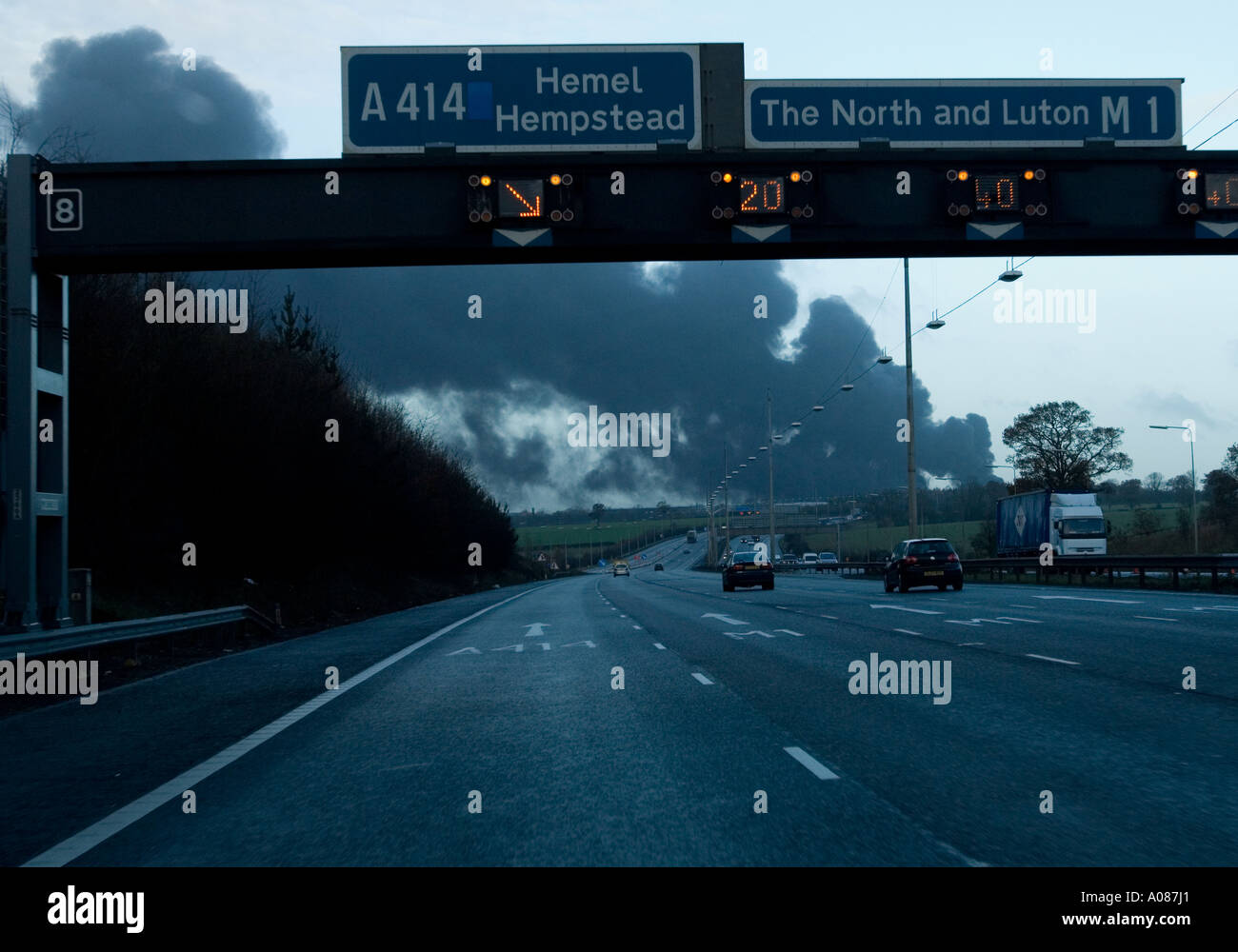 A vast plume of thick smoke billowing over the motorway after the ...
