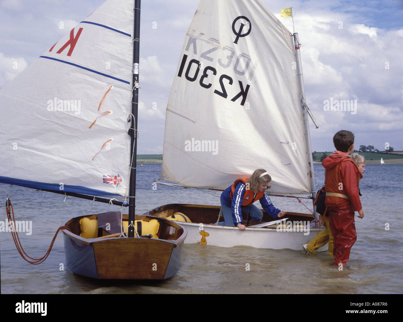 Children playing with sailing boat hi-res stock photography and images ...