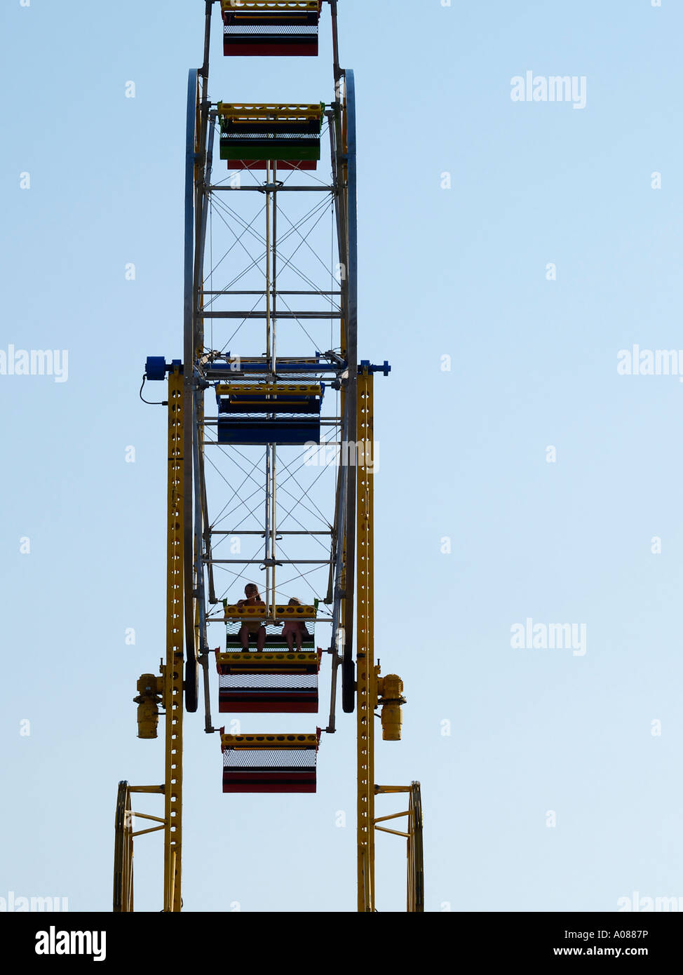 Two people wait suspended in the sky as the other half of the double ...