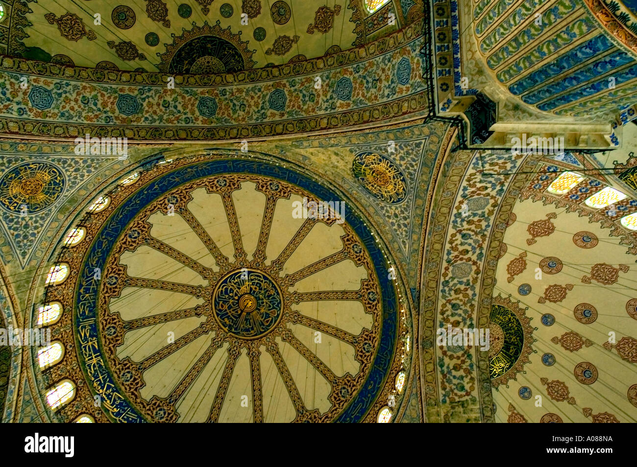 The beautiful, stunning domed ceiling and windows of the Blue Mosque ...