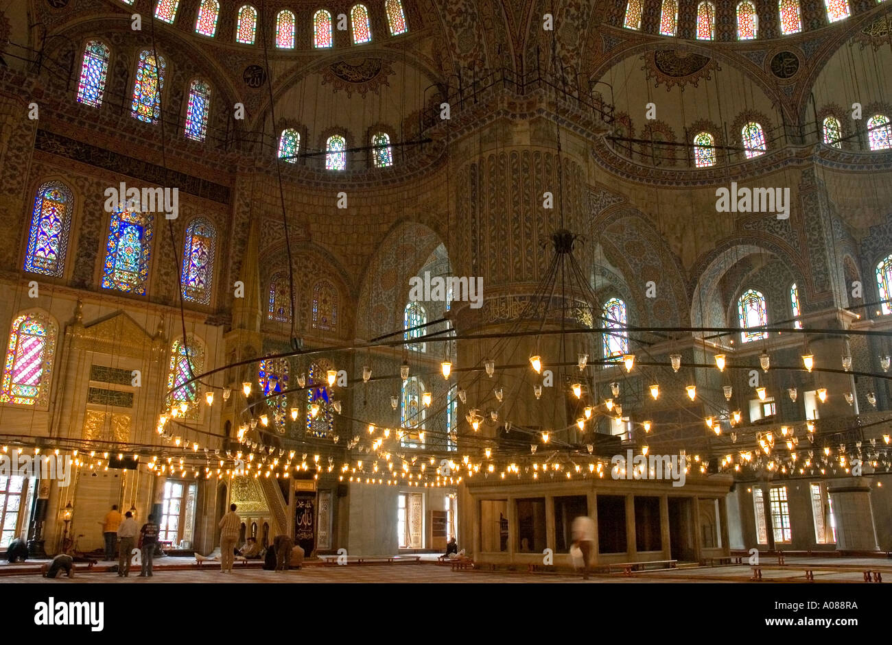 The beautiful, stunning domed ceiling and windows of the Blue Mosque ...