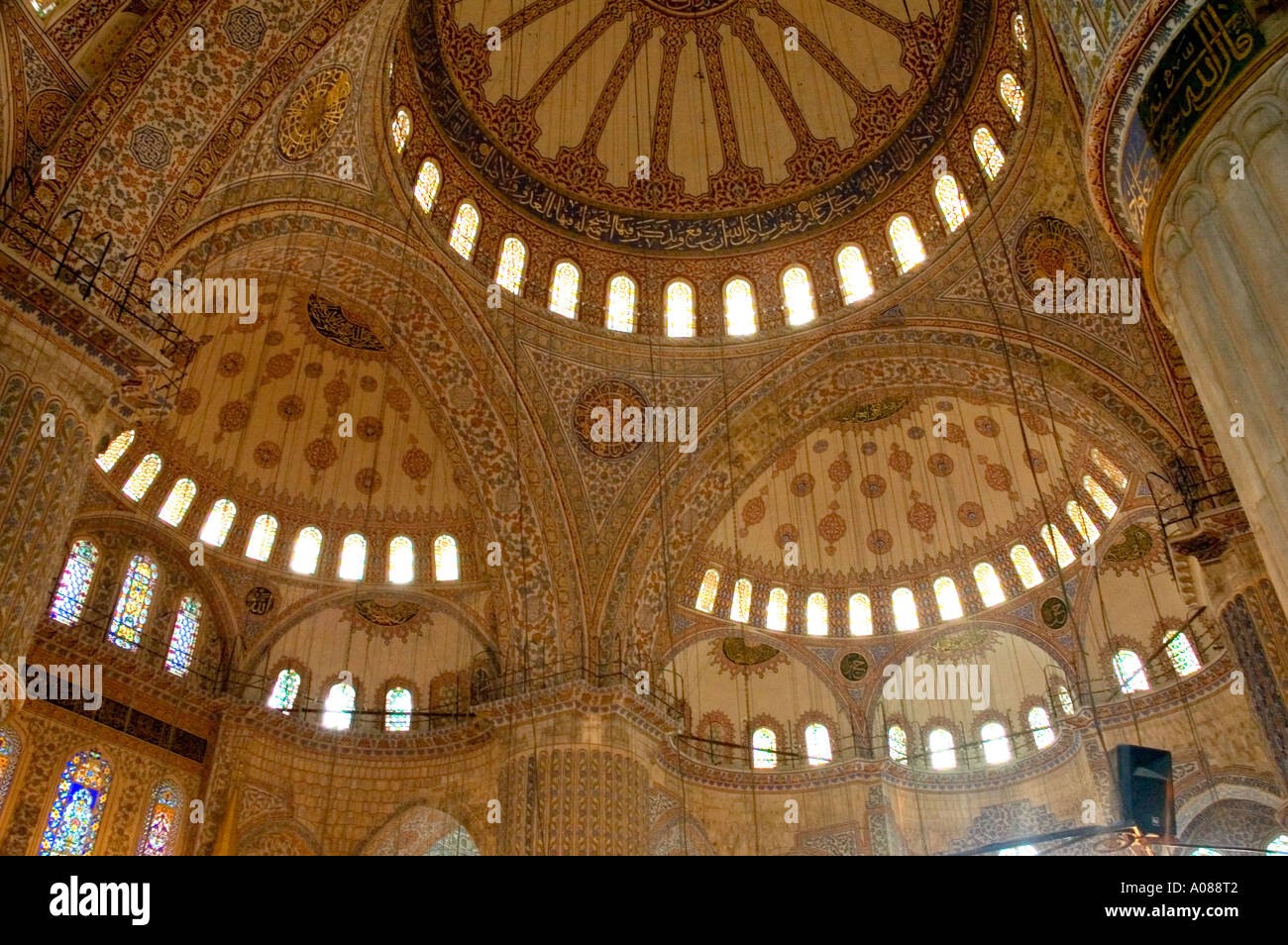The beautiful, stunning domed ceiling and windows of the Blue Mosque ...