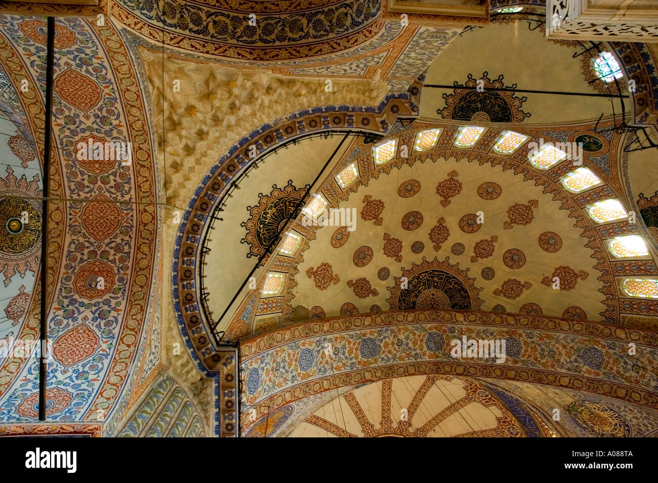 The beautiful, stunning domed ceiling and windows of the Blue Mosque ...