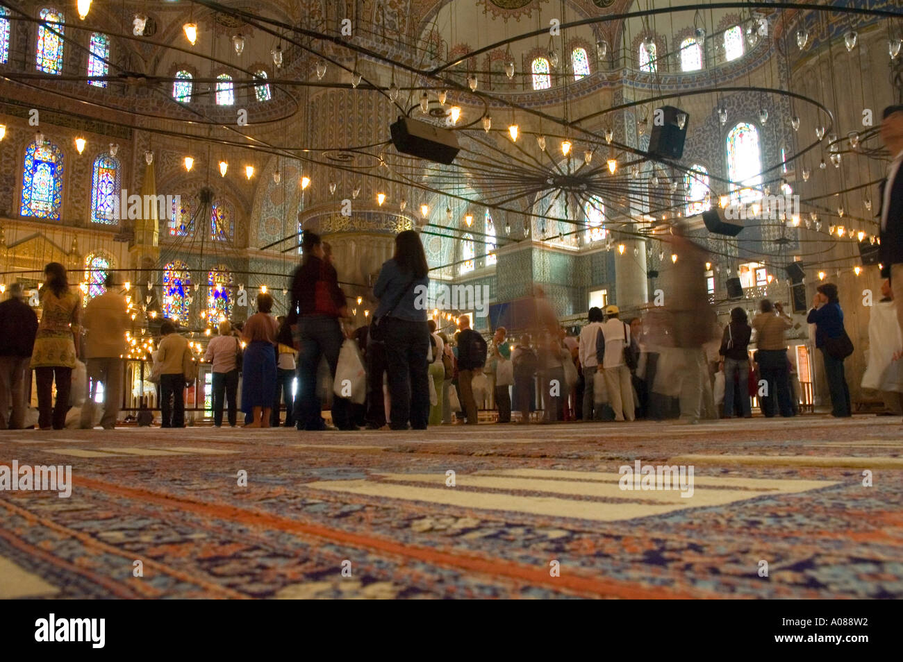 The beautiful, stunning domed ceiling and windows of the Blue Mosque ...
