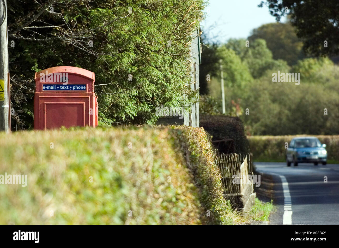 Old style BT phonebox with email and text facilities on the side of the ...