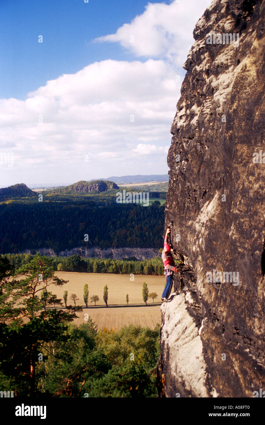 Rock Climber leading a route on the Lilienstein Elbsandsteingebirge ...