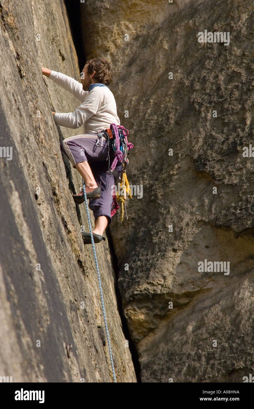 Rock Climber leading a traditional route in the Elbsandsteingebirge ...