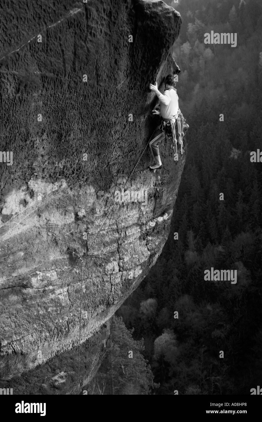 Rock Climber leading a traditional route in the Elbsandsteingebirge ...