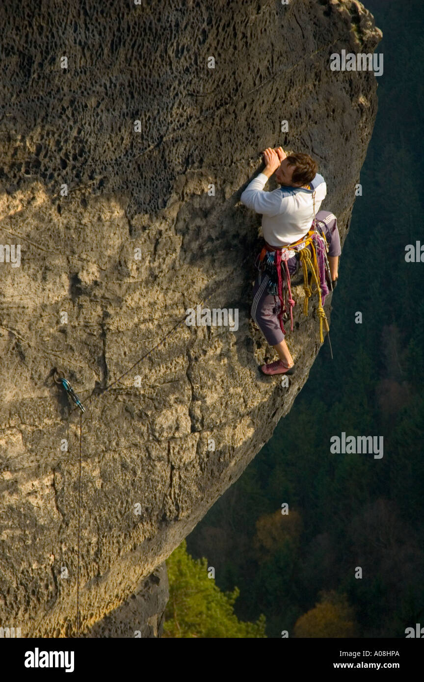 Rock Climber leading a traditional route in the Elbsandsteingebirge ...