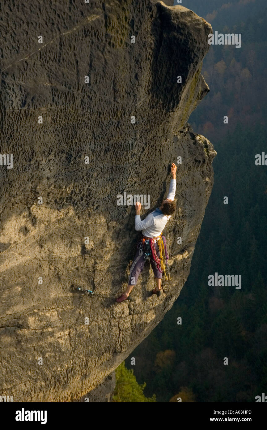 Rock Climber leading a traditional route in the Elbsandsteingebirge ...