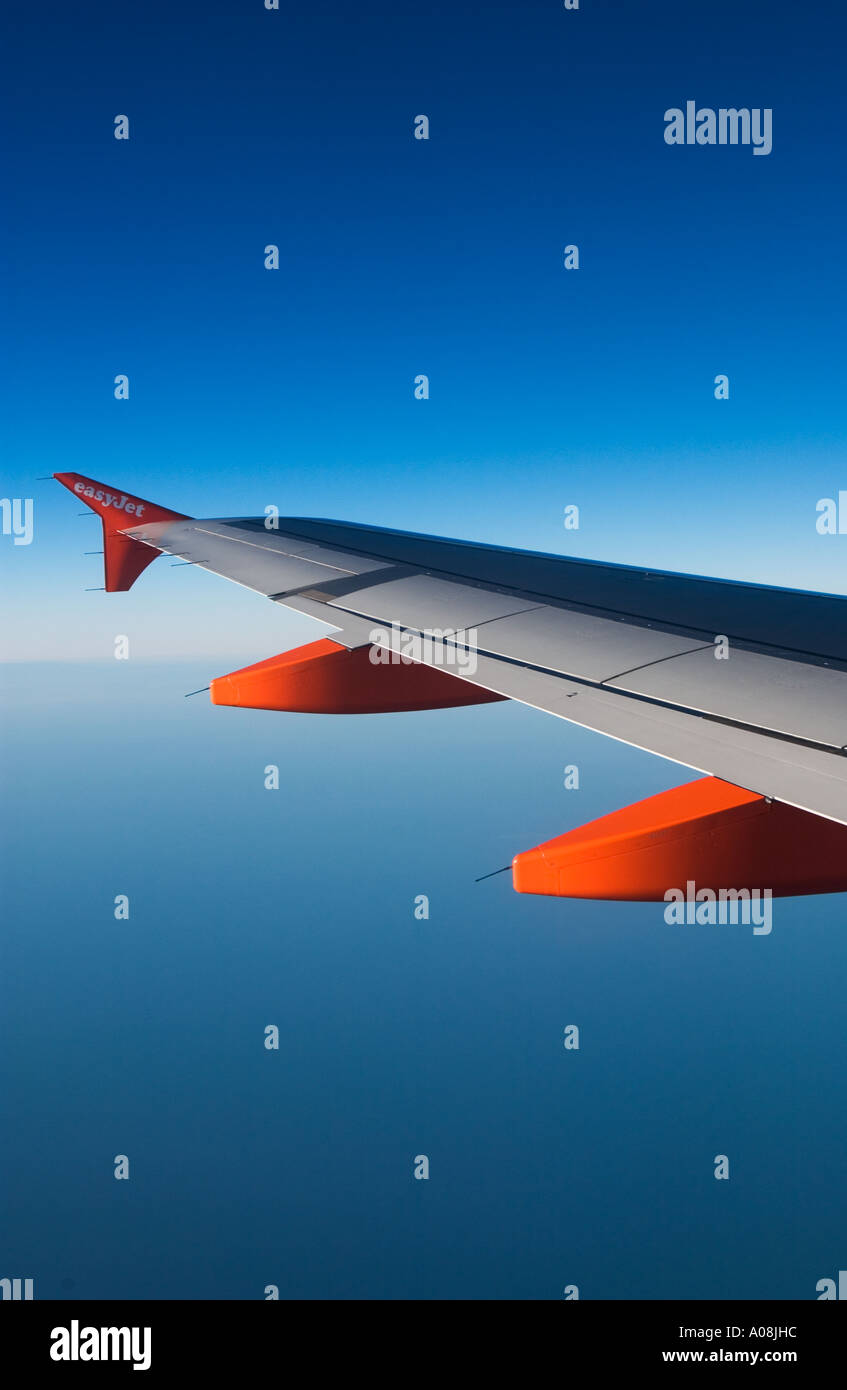 airplane wing in flight Stock Photo - Alamy
