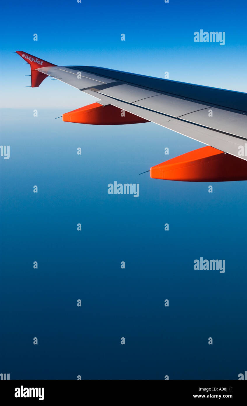 airplane wing in flight Stock Photo - Alamy