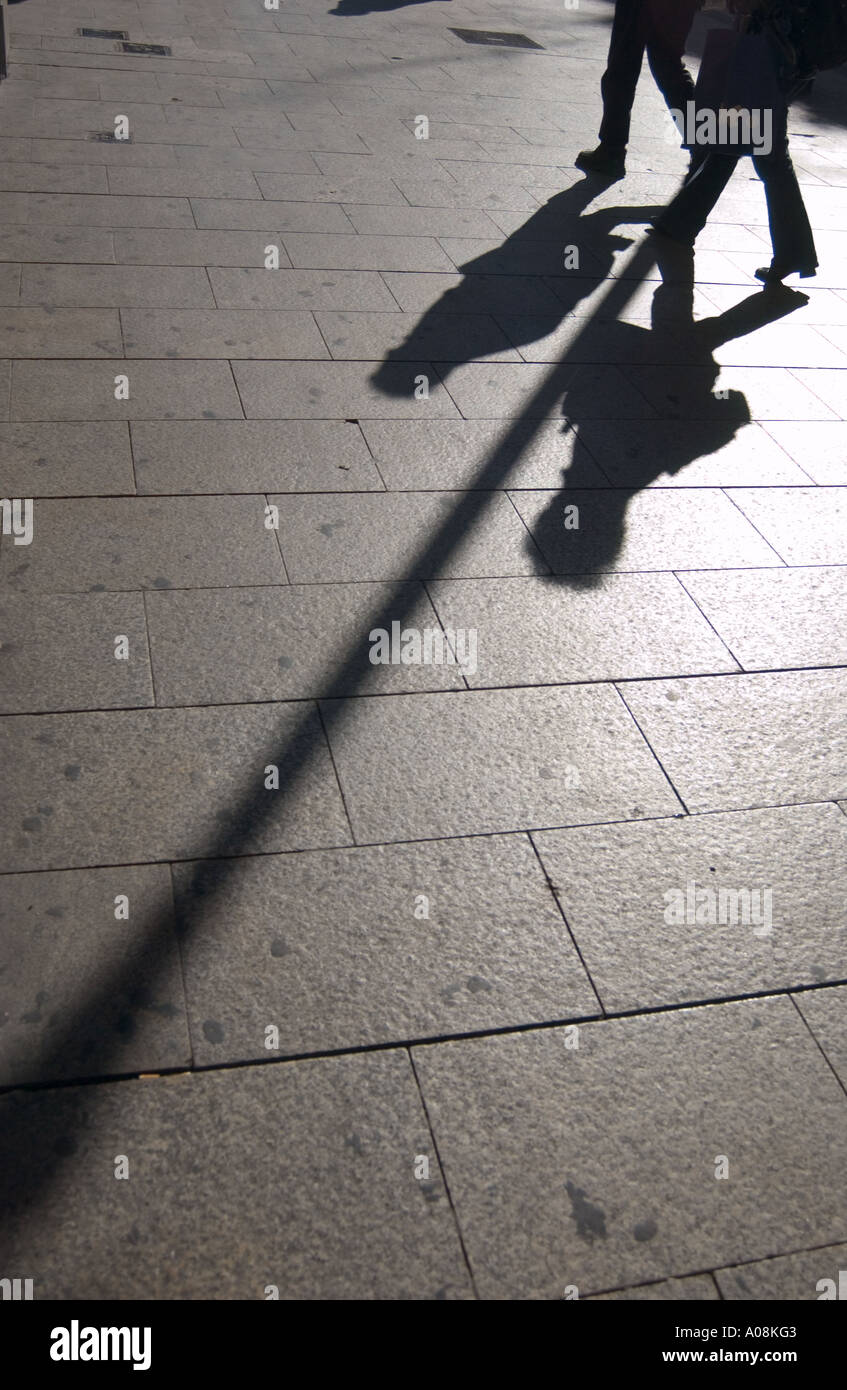 shadow of 2 people walking Stock Photo - Alamy