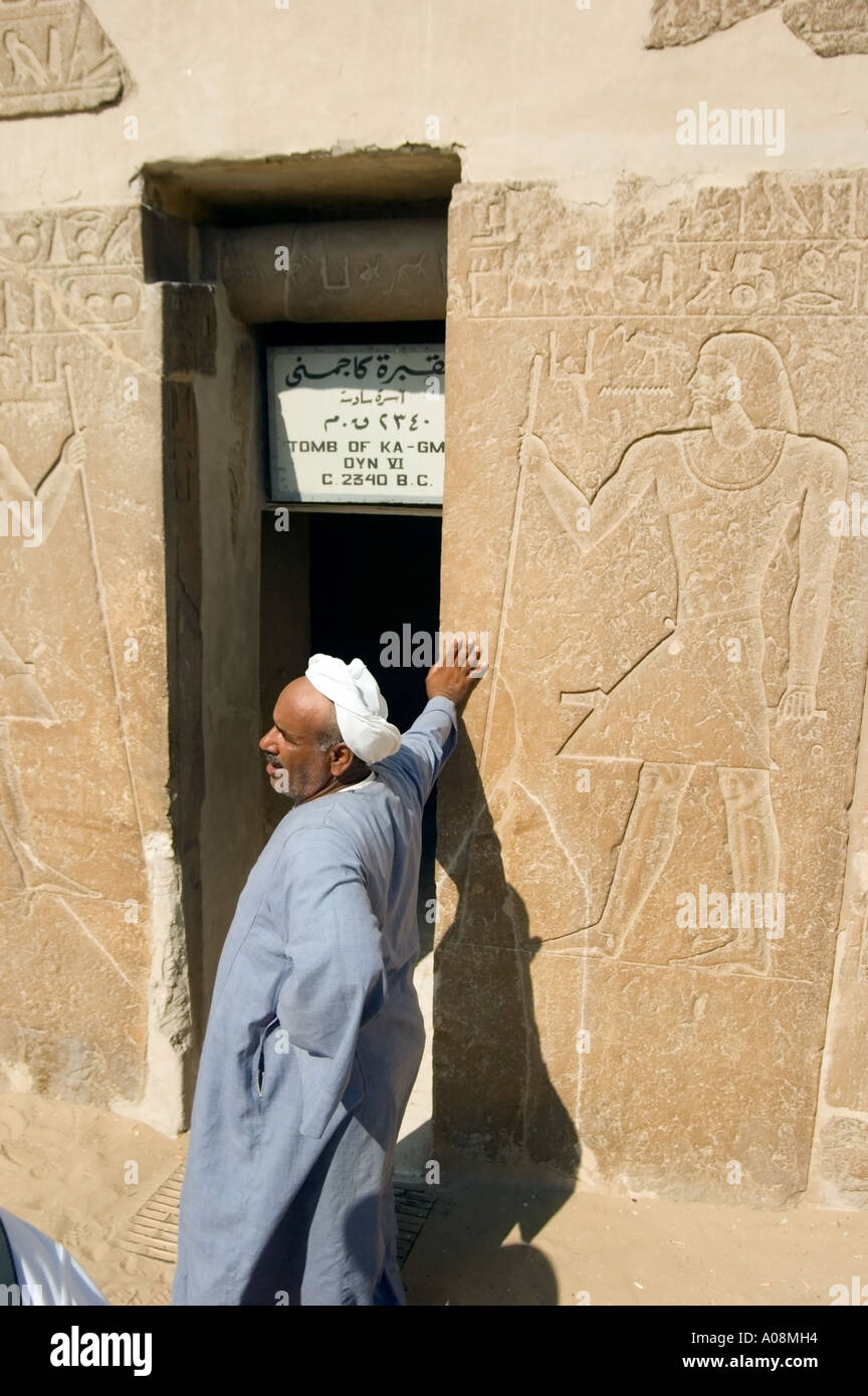 Guide at the entrance of one of the tombs at the Pyramid complex at ...