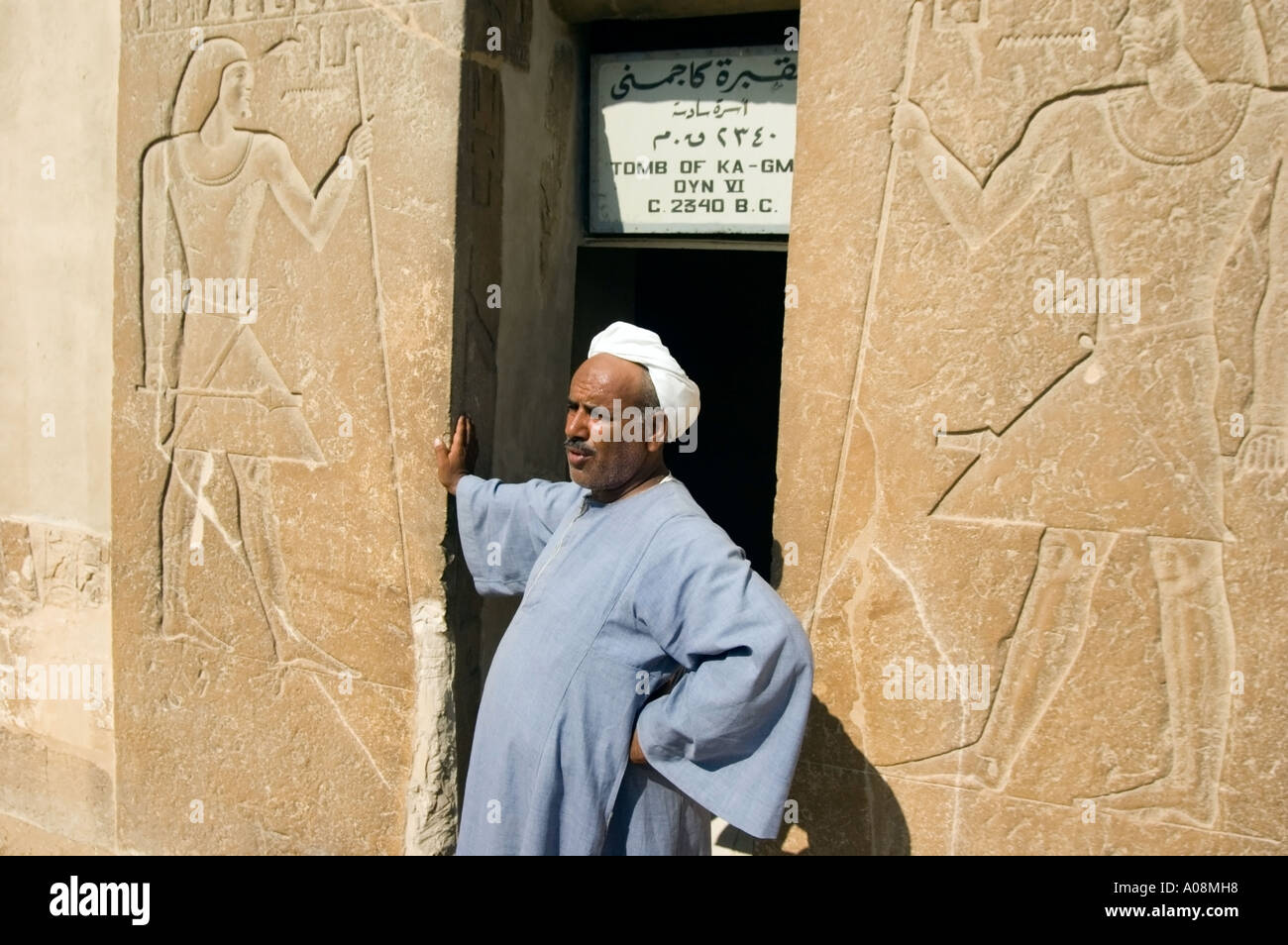 Guide at the entrance of one of the tombs at the Pyramid complex at ...